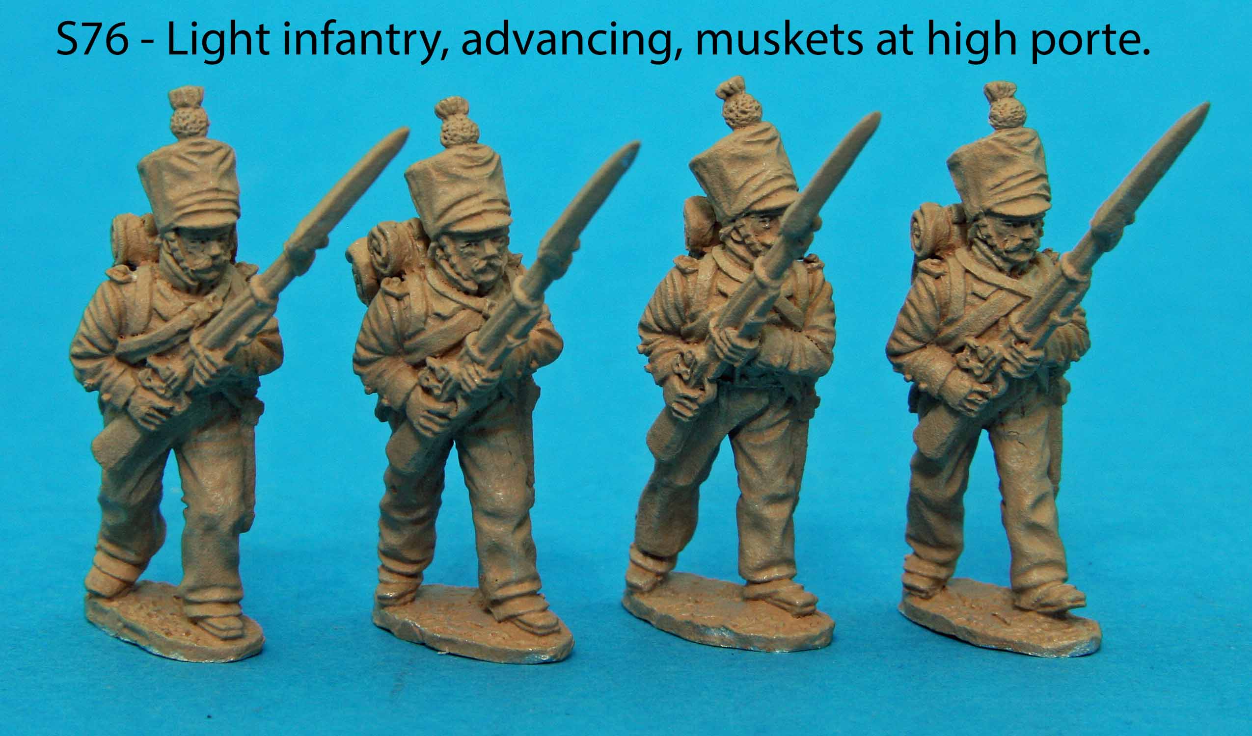 S76 - Four light infantry figures in advancing poses. Muskets at high ...